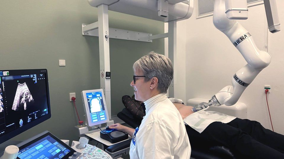 Forbedrer oplevelse og arbejdsmiljø: Robot hjælper med ...